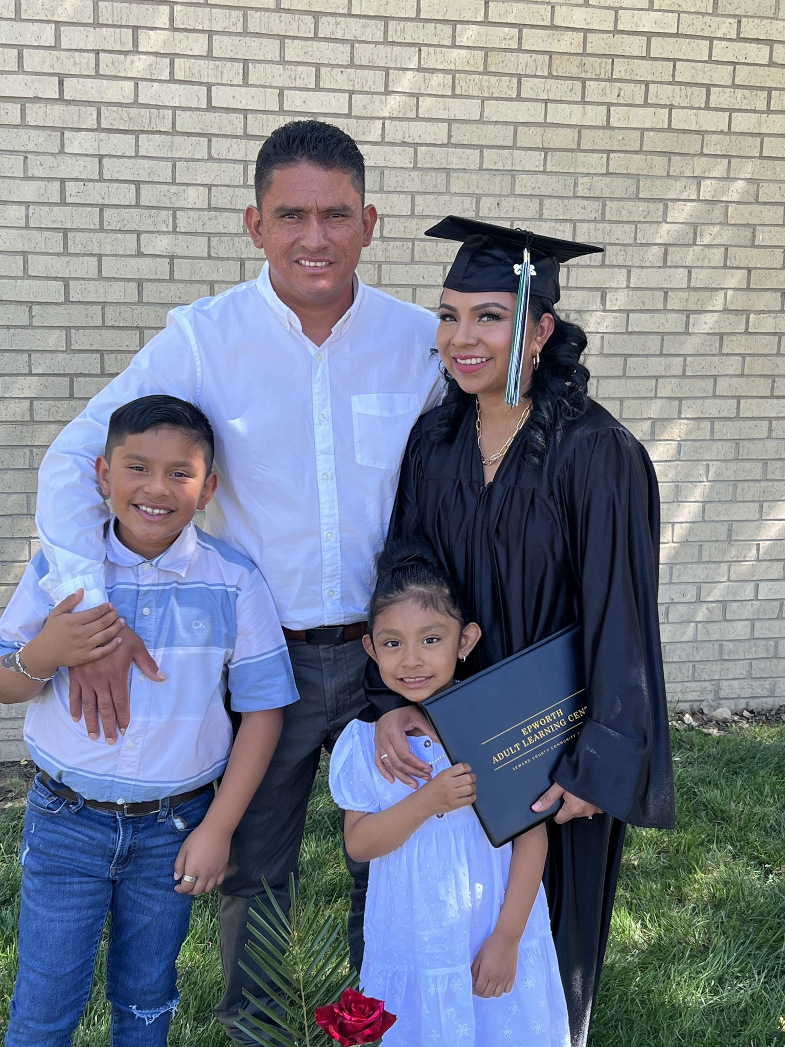 Kansas High School Diploma graduates walk the stage at Jesus A ...